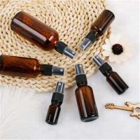 China Stock Amber Glass Spray Bottle 10ml 15ml 20ml 30ml 50ml 100ml Round Glass Empty Perfume Bottle Black Cap Cylinder Bottle Perfume for sale