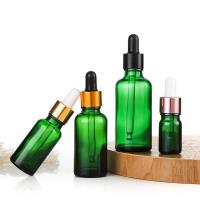 China Sealing Type Dropper Green Frosted Glass Cosmetic Bottle 10ml 15ml 30ml 50ml for Face Serum and Face Oil Container Packaging for sale