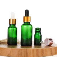 China Sealing Type Dropper Green Frosted Glass Cosmetic Bottle 10ml 15ml 30ml 50ml for Face Serum and Face Oil Container Packaging for sale