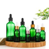 China Sealing Type Dropper Green Frosted Glass Cosmetic Bottle 10ml 15ml 30ml 50ml for Face Serum and Face Oil Container Packaging for sale