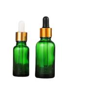 China Sealing Type Dropper Green Frosted Glass Cosmetic Bottle 10ml 15ml 30ml 50ml for Face Serum and Face Oil Container Packaging for sale