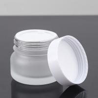 China Stock Luxury Skin Care Glass Jar 50g Empty Frosted Cosmetic Packaging with Black Lid and Glass Bottle Plastic Cap White Disc for sale