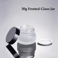 China Stock Luxury Skin Care Glass Jar 50g Empty Frosted Cosmetic Packaging with Black Lid and Glass Bottle Plastic Cap White Disc for sale