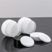 China Stock Luxury Skin Care Glass Jar 50g Empty Frosted Cosmetic Packaging with Black Lid and Glass Bottle Plastic Cap White Disc for sale