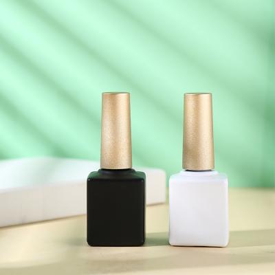 China 15ml White and Black Empty Gel Nail Polish Bottles Glass Body PP Cap Dupont Brush Clear Top Silver Gold Nail Polish Caps for sale