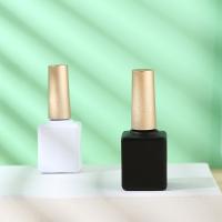 China 15ml White and Black Empty Gel Nail Polish Bottles Glass Body PP Cap Dupont Brush Clear Top Silver Gold Nail Polish Caps for sale