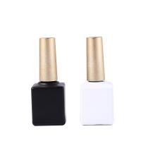China 15ml White and Black Empty Gel Nail Polish Bottles Glass Body PP Cap Dupont Brush Clear Top Silver Gold Nail Polish Caps for sale