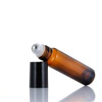 China 5ml 10ml 15ml Essential Oil Perfume Round Glass Amber Frosted Roll on Bottle with Roller Customized Colors and Free Sample for sale