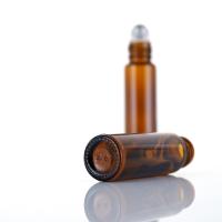 China 5ml 10ml 15ml Essential Oil Perfume Round Glass Amber Frosted Roll on Bottle with Roller Customized Colors and Free Sample for sale