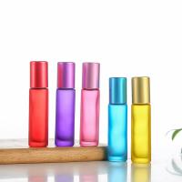 China 5ml 10ml 15ml Essential Oil Perfume Round Glass Amber Frosted Roll on Bottle with Roller Customized Colors and Free Sample for sale