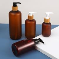 China 300ml 500ml Biodegradable Bamboo Cap Amber Matt Black PET Bottle for in Other Cosmetic Body Wash Shampoo Hair Conditioner for sale
