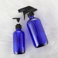 China Cobalt Blue Glass Trigger Spray Bottle 250ml 500ml 1000ml Glass Boston Lotion Bottle with Pump and Logo/Graphic Design for sale