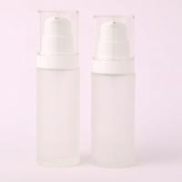 China Customized Colors 15ml 30ml 50ml Clear Frosted Empty Mini Perfume Glass Serum Pump Bottle for Skincare Packaging for sale