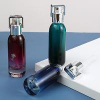 China Facial Cleanser Green Blue Glass Serum Bottle with Silver Pressure Pump 15ml 30ml 50ml Cosmetic Packaging Luxury Design for sale