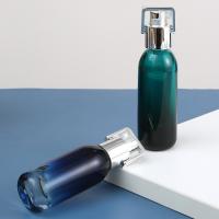 China Facial Cleanser Green Blue Glass Serum Bottle with Silver Pressure Pump 15ml 30ml 50ml Cosmetic Packaging Luxury Design for sale