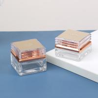 China 15g 30g 50g Clear Square Glass Cosmetic Jar with Rose Golden Lids Customized Colors and Senior PAK Luxury for sale