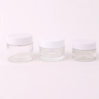 China Empty Glossy or Matte Round Shaped Cosmetic Glass Cream Jars with Lid Collar Material Glass 5g 10g 15g 20g 60g Industrial for sale