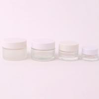 China Empty Glossy or Matte Round Shaped Cosmetic Glass Cream Jars with Lid Collar Material Glass 5g 10g 15g 20g 60g Industrial for sale