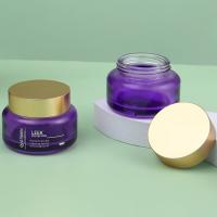 China Luxury Empty Glass Face Cream Jar 30g Refillable Body Butter Jars 1oz Cosmetic Round Purple Glass Jars with Golden Matte Lids for sale