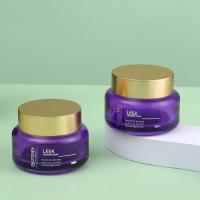 China Luxury Empty Glass Face Cream Jar 30g Refillable Body Butter Jars 1oz Cosmetic Round Purple Glass Jars with Golden Matte Lids for sale