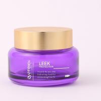 China Luxury Empty Glass Face Cream Jar 30g Refillable Body Butter Jars 1oz Cosmetic Round Purple Glass Jars with Golden Matte Lids for sale