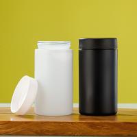 China Logo/Graphic Design Borosilicate Glass Round Storage Jars with Childproof Cap in Black Matte and White Matte for sale