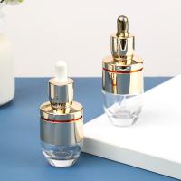 China Senior PAK Unique Design Customize Label Printing Empty Glass CBD Serume Oil Dropper Bottle with Silver or Gold Top for sale