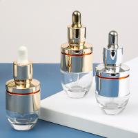 China Senior PAK Unique Design Customize Label Printing Empty Glass CBD Serume Oil Dropper Bottle with Silver or Gold Top for sale