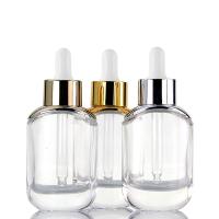 China Other Cosmetic CUSTOM Empty Oval Unique Essential Oils Glass Dropper Bottle for Hair Oil 15ml 30ml 50ml 1oz 2oz for sale