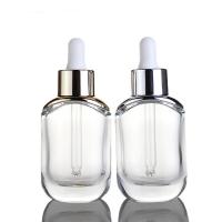 China Other Cosmetic CUSTOM Empty Oval Unique Essential Oils Glass Dropper Bottle for Hair Oil 15ml 30ml 50ml 1oz 2oz for sale