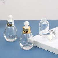 China 15ml 30ml 50ml Mini Luxury Unique Water Drop Shape Essential Hair Oil Dropper Empty Glass Bottle with Silver or Gold Dropper for sale