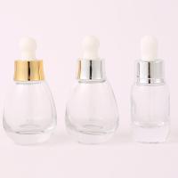 China 15ml 30ml 50ml Mini Luxury Unique Water Drop Shape Essential Hair Oil Dropper Empty Glass Bottle with Silver or Gold Dropper for sale