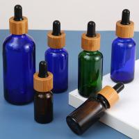 China Essential Oil Frosted Bamboo Dropper Glass Bottle in 1oz 2oz 5ml 15ml 30ml with Easy and Cosmetic Serum Box for sale