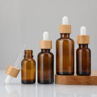 China Essential Oil Frosted Bamboo Dropper Glass Bottle in 1oz 2oz 5ml 15ml 30ml with Easy and Cosmetic Serum Box for sale