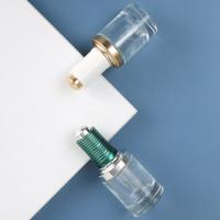 China 30-50ml Round Clear Dropper Glass Skin Care Oil Bottle with White Push Dropper Assembled Dropper for sale