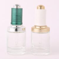 China 30-50ml Round Clear Dropper Glass Skin Care Oil Bottle with White Push Dropper Assembled Dropper for sale