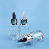 China Skin Care Serum Cream Bottles 15ml 30ml 50ml Clear Green Glass Designs with Stirring Stick Customizable for sale