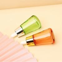 China Industrial Cosmetic Elegant 30ml 50ml 1oz 2oz Green Empty Oil Serum Dropper Bottles with Box Customize Unique Cone Shape for sale