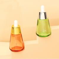 China Industrial Cosmetic Elegant 30ml 50ml 1oz 2oz Green Empty Oil Serum Dropper Bottles with Box Customize Unique Cone Shape for sale