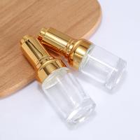 China Round Glass Bottle Alu Dropper Essential Oil Bottle with Box Customize Luxury Oil Push Button Flat Shoulder 20ml 30ml 50ml for sale