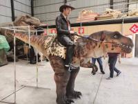 China Theme Park Realistic Animatronic Dinosaur Ride Costume Stilts T-rex Costume for sale