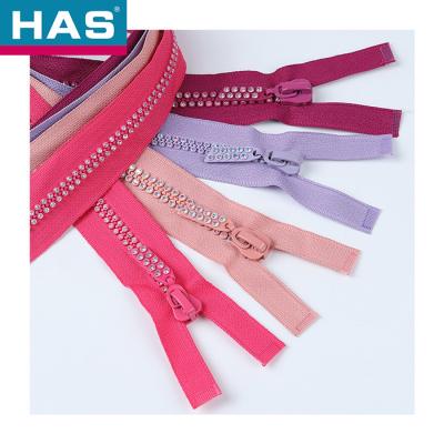 China 2025 Hot Sale 3# 5# 8# Diamond Stone Teeth Zipper of Plastic Zipper for sale