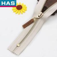 China Eco Friendly Custom Metal Close-end Zipper With Leather Puller In Shiny Gold / Light Gold Teeth for sale