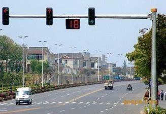 China Hot Roll 10m Single Arm Traffic Signal Steel Tubular Pole for sale