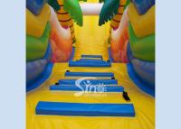 China Giant Double Lane Dragon Inflatable Forest Slide 0.55mm PVC Tarpaulin with Palm Trees for sale