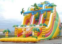 China Giant Double Lane Dragon Inflatable Forest Slide 0.55mm PVC Tarpaulin with Palm Trees for sale