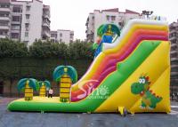 China Giant Double Lane Dragon Inflatable Forest Slide 0.55mm PVC Tarpaulin with Palm Trees for sale