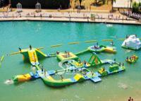China 40x32m Giant Inflatable Floating Water Park with Iceberg Spinner and Seesaw for Kids and Adults for sale