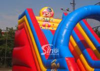 China Popular children happy clown inflatable slide with arch full digitally printed for sale