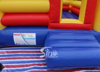 China Commercial Kids Rainbow Inflatable Bouncy Castle with Slide 5.8m x 5.0m CE Certified for sale